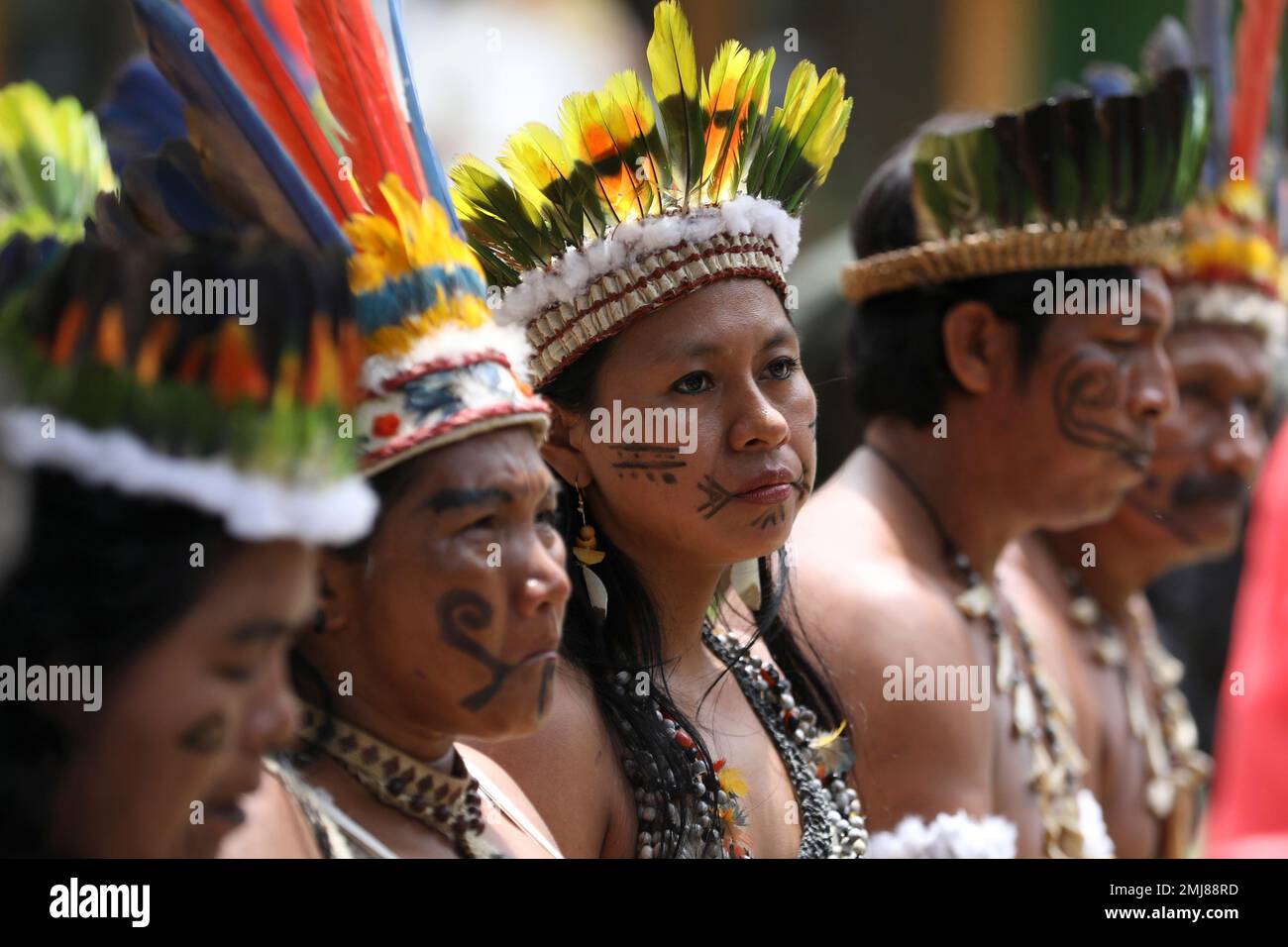 Representatives of the Huitoto and Ticuna indigenous communities sit ...