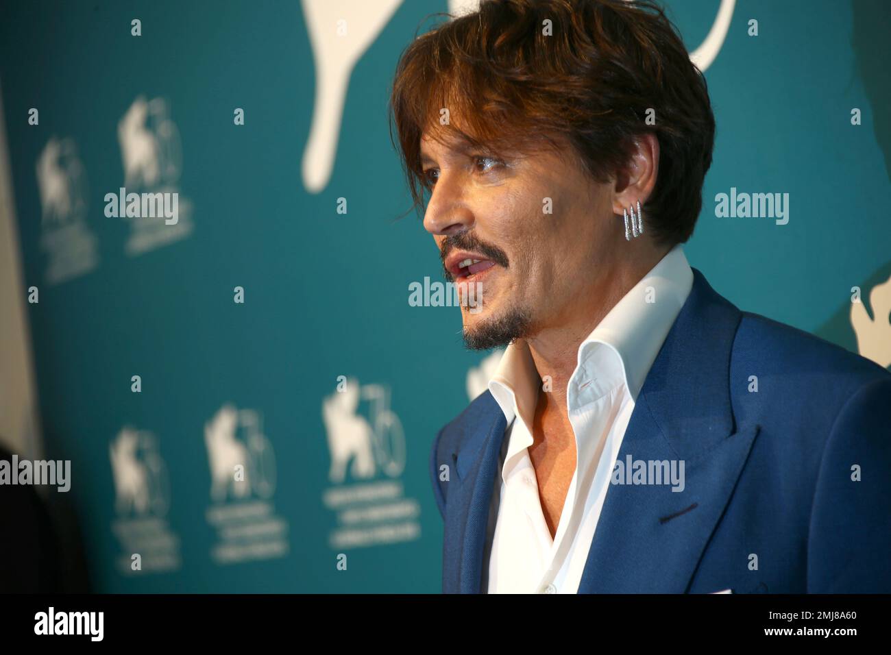 Actor Johnny Depp poses for photographers at the photo call for the ...