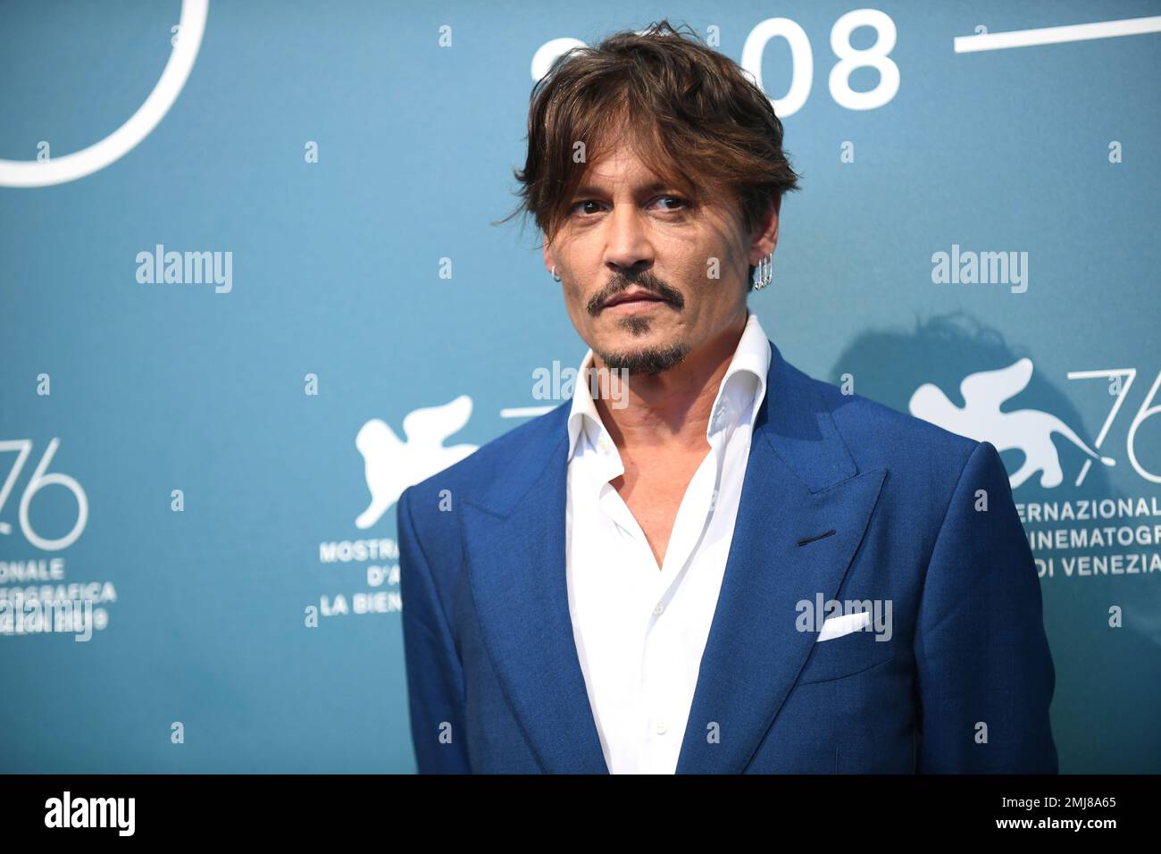 Actor Johnny Depp poses for photographers at the photo call for the ...