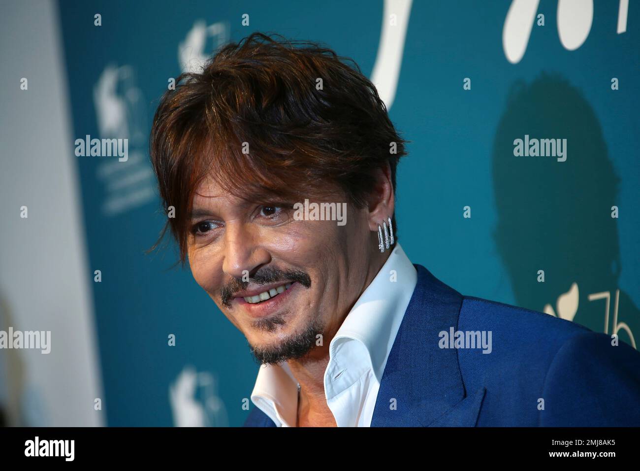 Actor Johnny Depp poses for photographers at the photo call for the ...