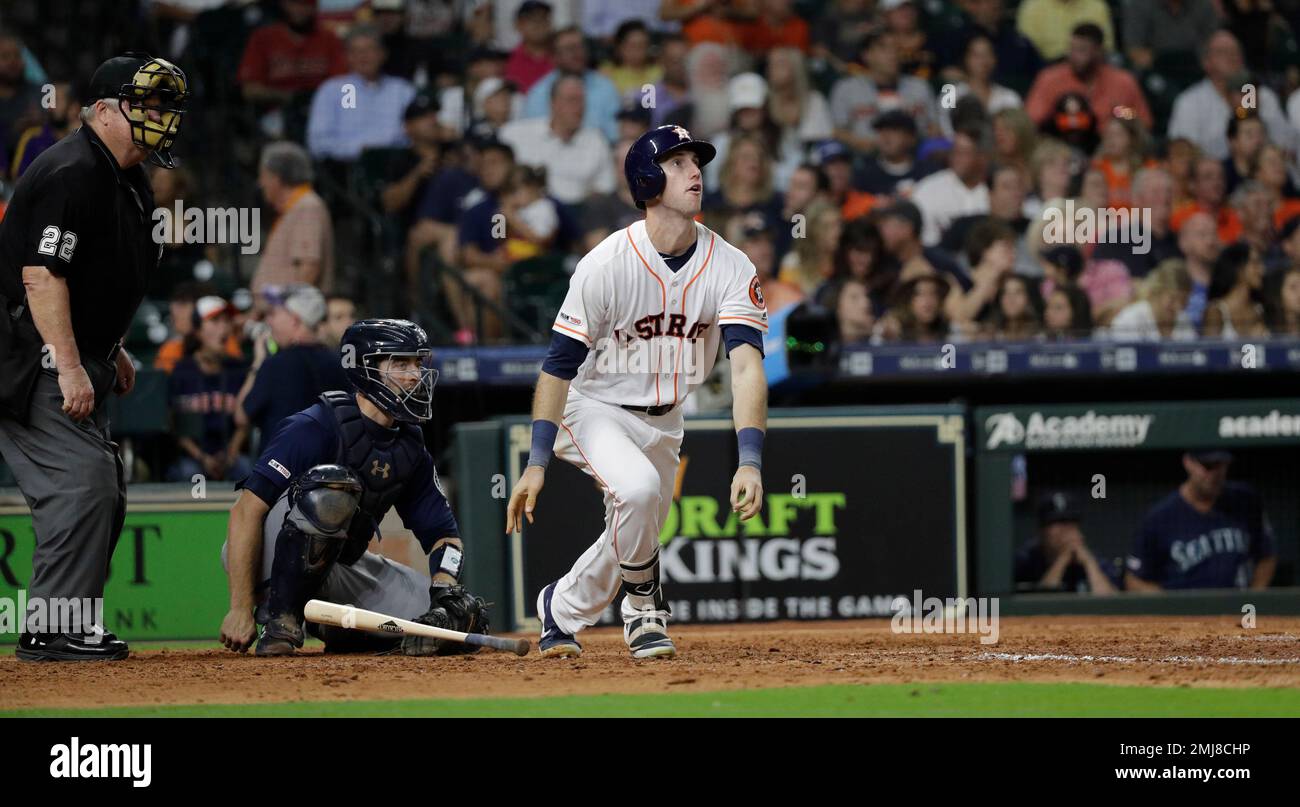 Houston Astros' Kyle Tucker, right, watches his home run along with ...