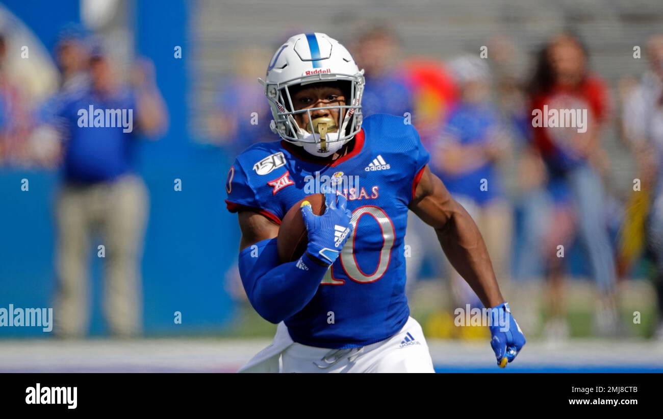 Kansas running back Khalil Herbert runs for a first down during the ...