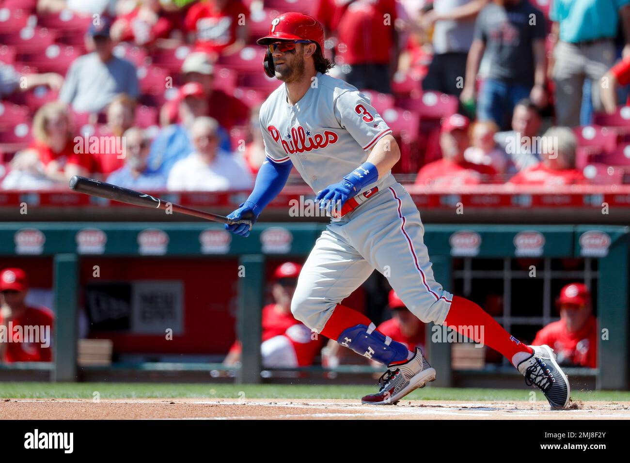 Philadelphia Phillies' Bryce Harper hits a bunt single off Cincinnati ...