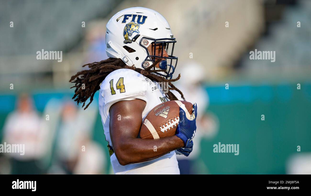 FIU wide receiver Darrius Scott (14) runs during an NCAA football game ...
