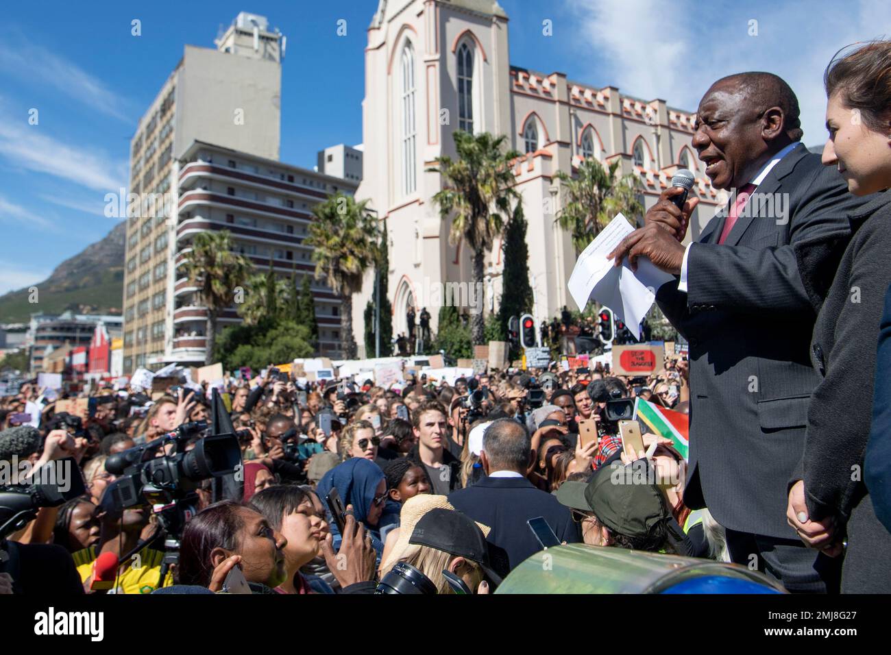 South African President, Cyril Ramaphosa, right, addresses protesters ...