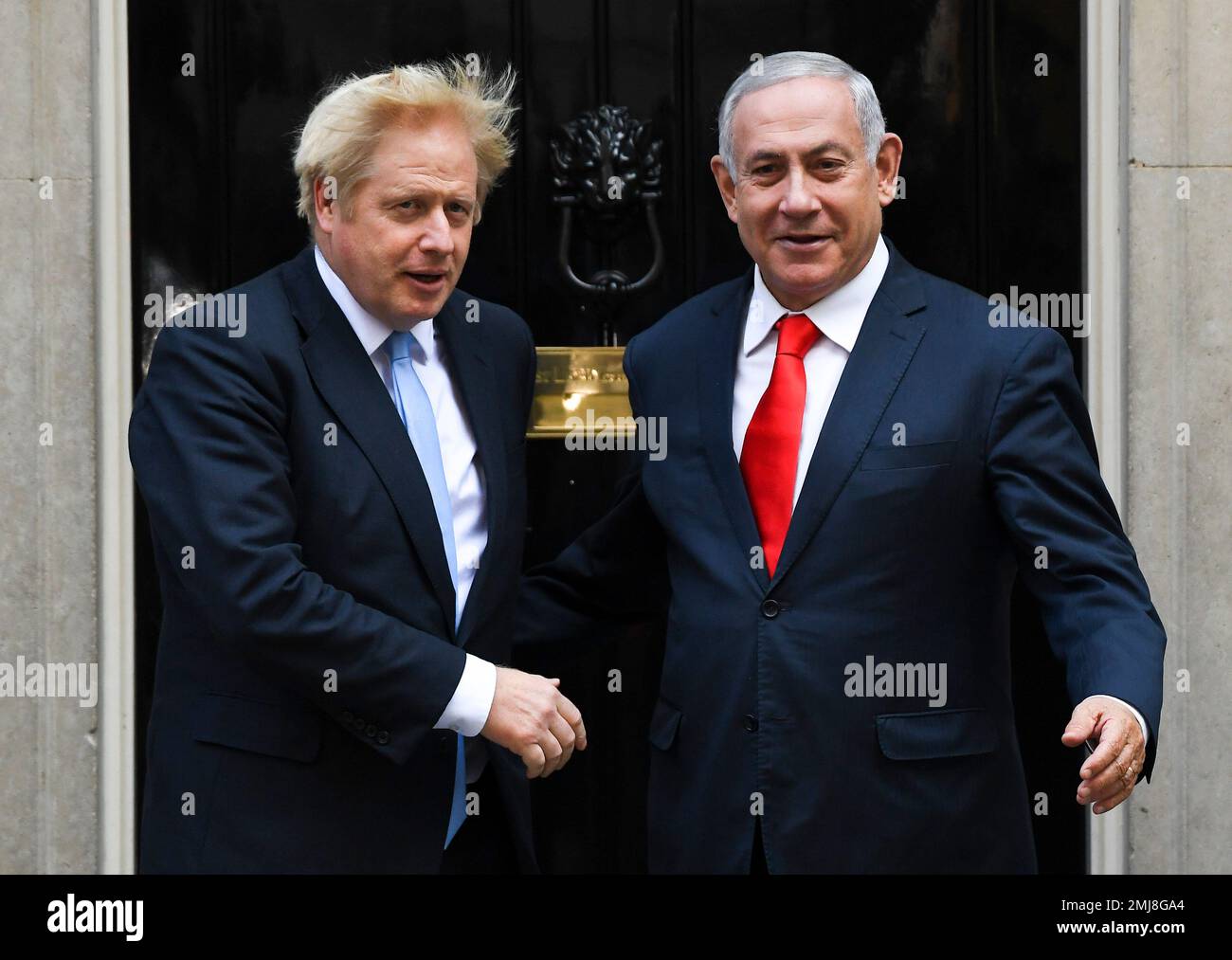 Britain's Prime Minister Boris Johnson greets Israeli Prime Minister ...