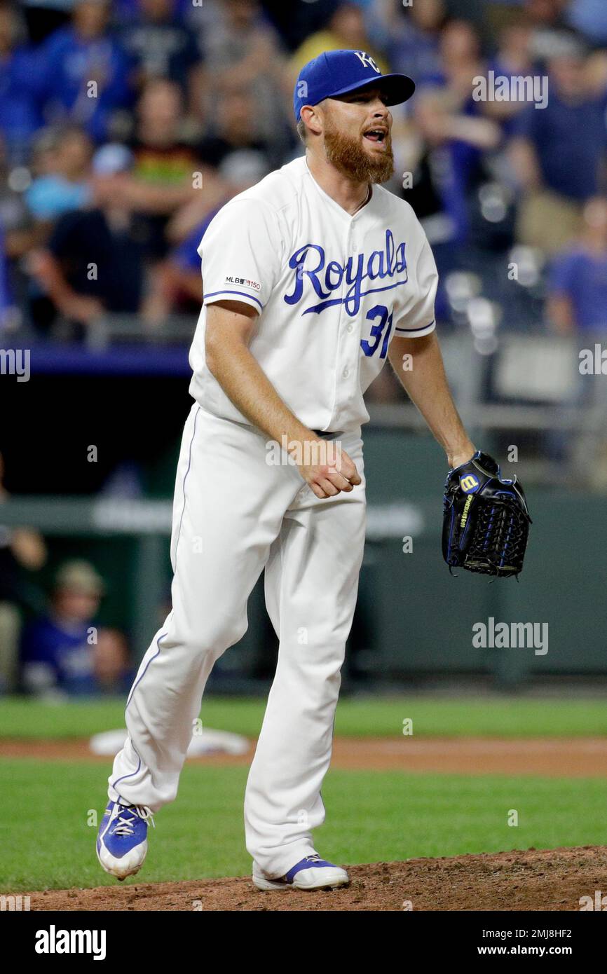Kansas City Royals relief pitcher Ian Kennedy celebrates after the team ...