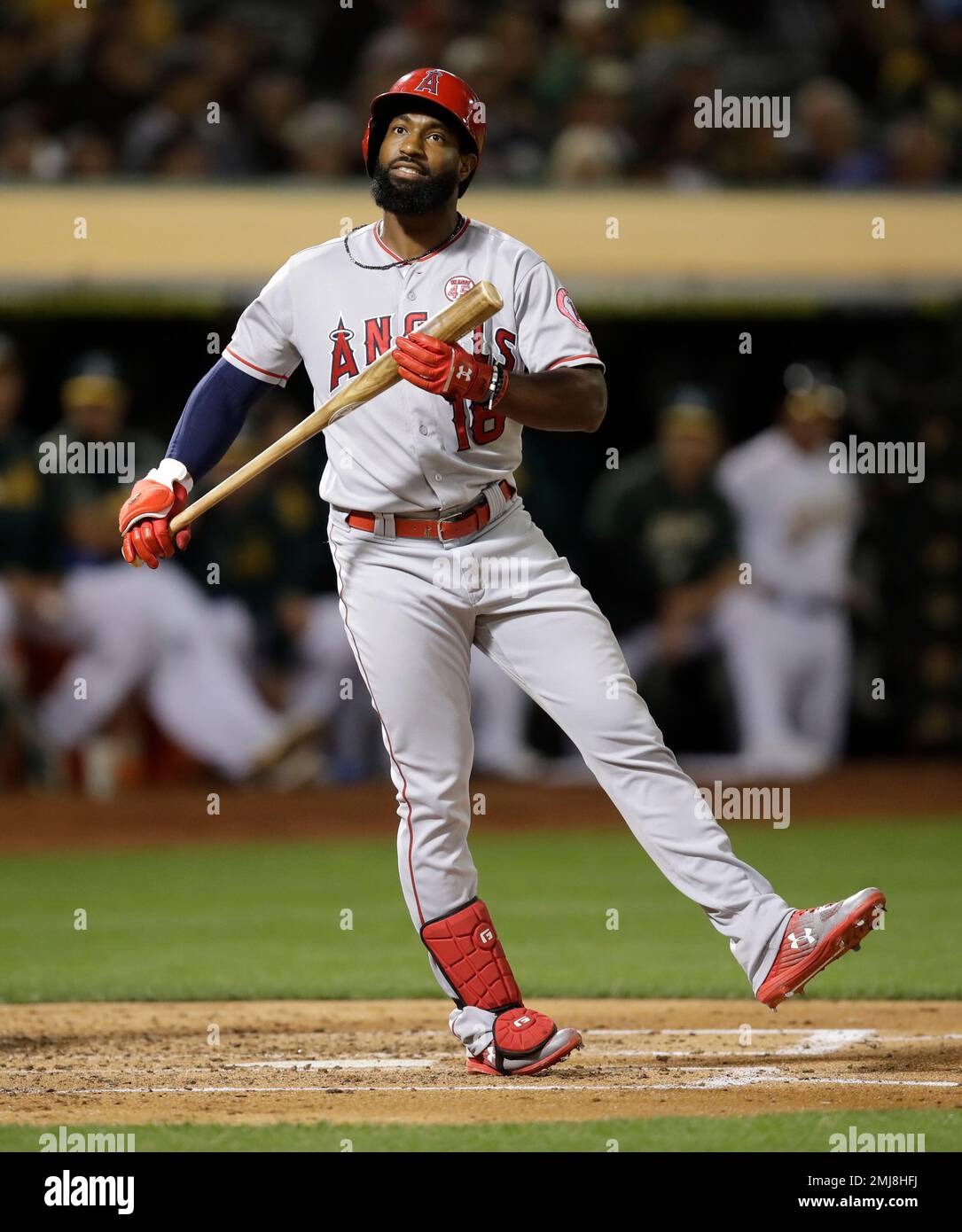 Los Angeles Angels' Brian Goodwin reacts to a strike thrown by Oakland ...