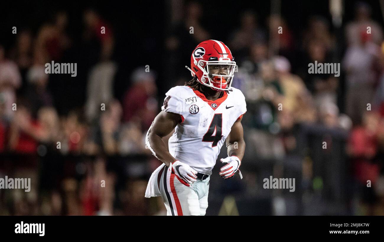 Georgia Bulldogs running back James Cook (4) moves on the field against ...