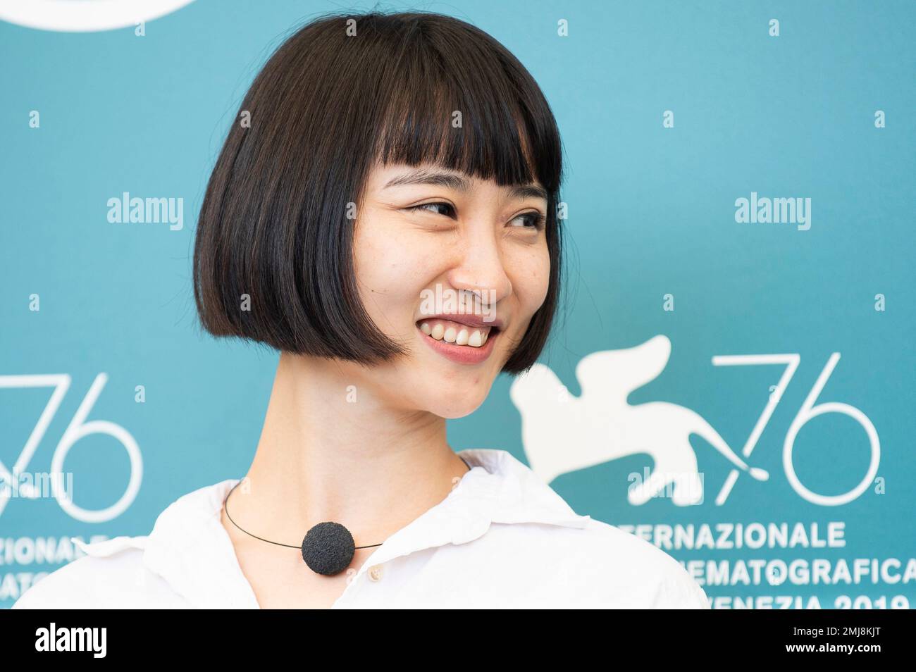 Actress Huang Xiangli poses for photographers at the photo call for the ...