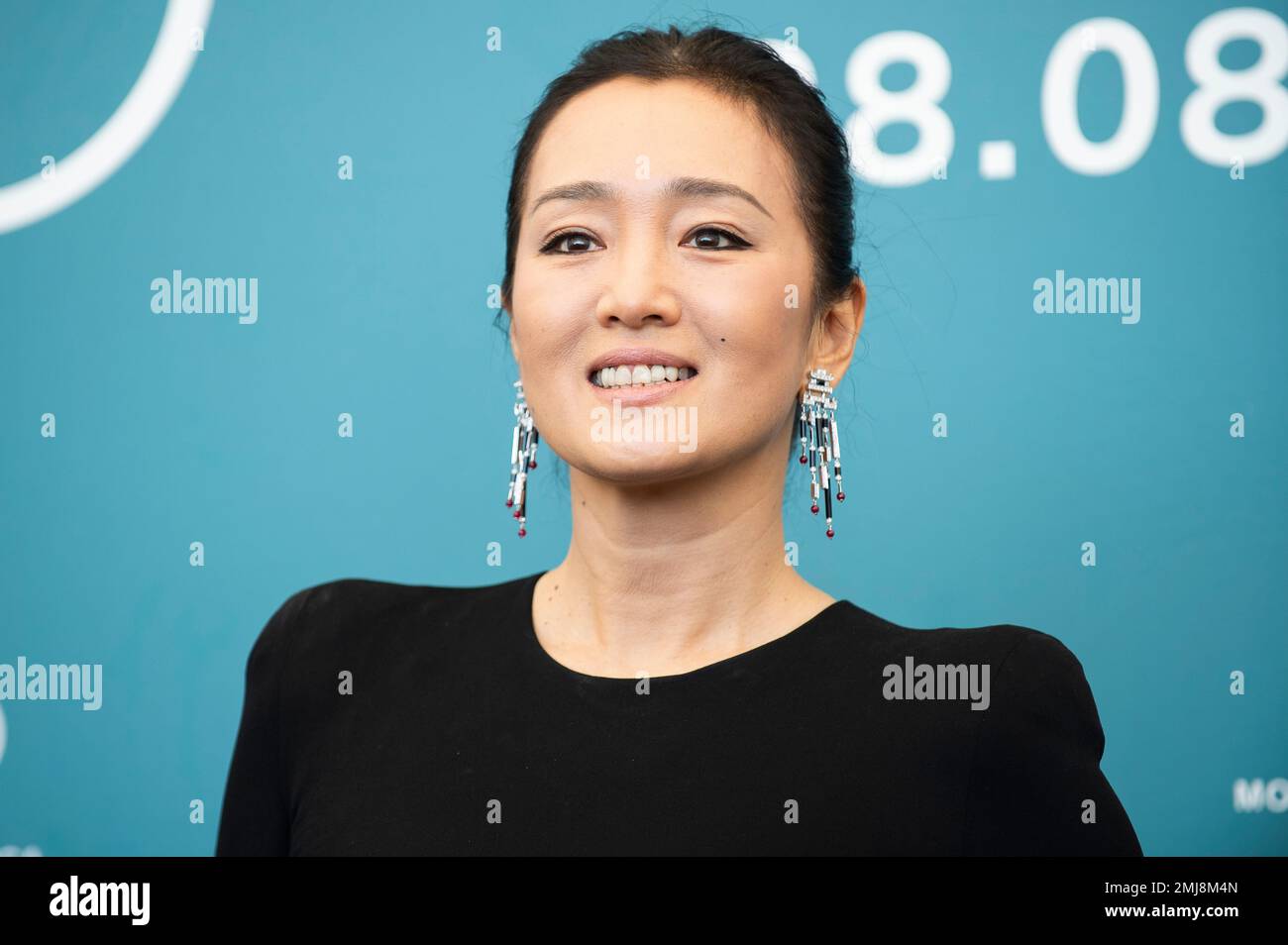 Actress Gong Li poses for photographers at the photo call for the film ...