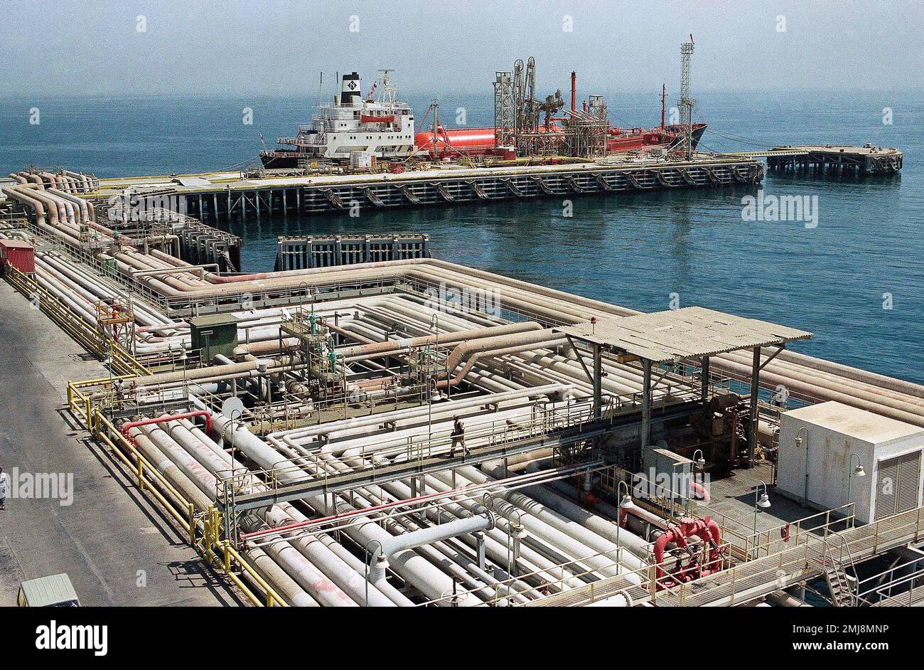 FILE - In this Sept. 25, 1990 file photo, oil pipelines snake through ...