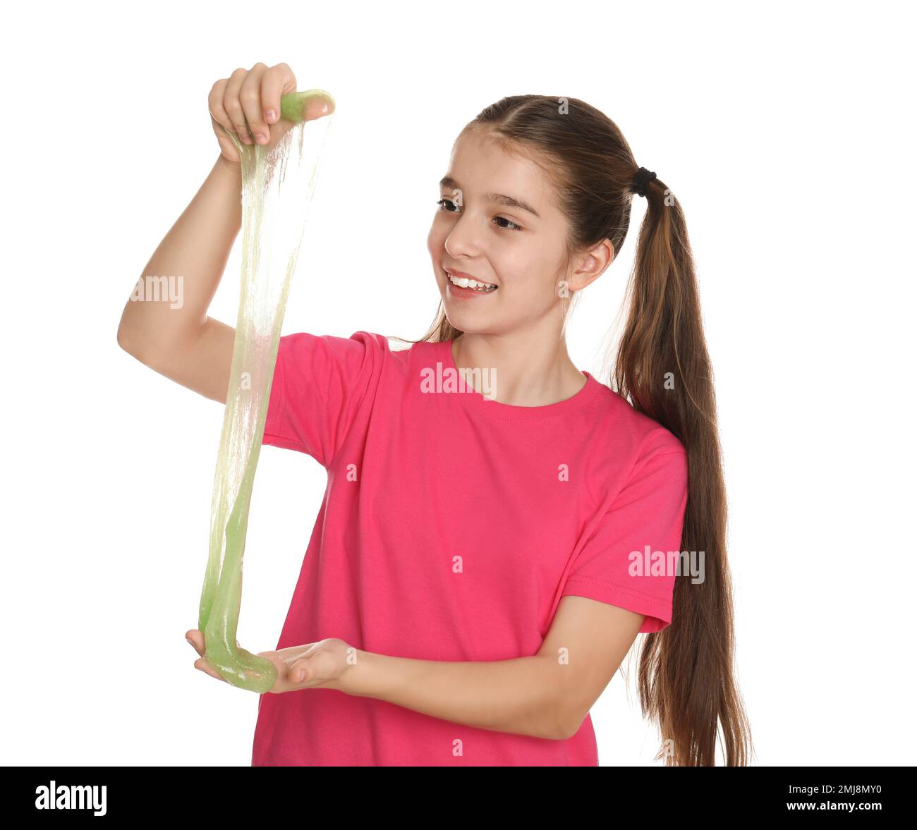 Preteen girl with slime on white background Stock Photo - Alamy