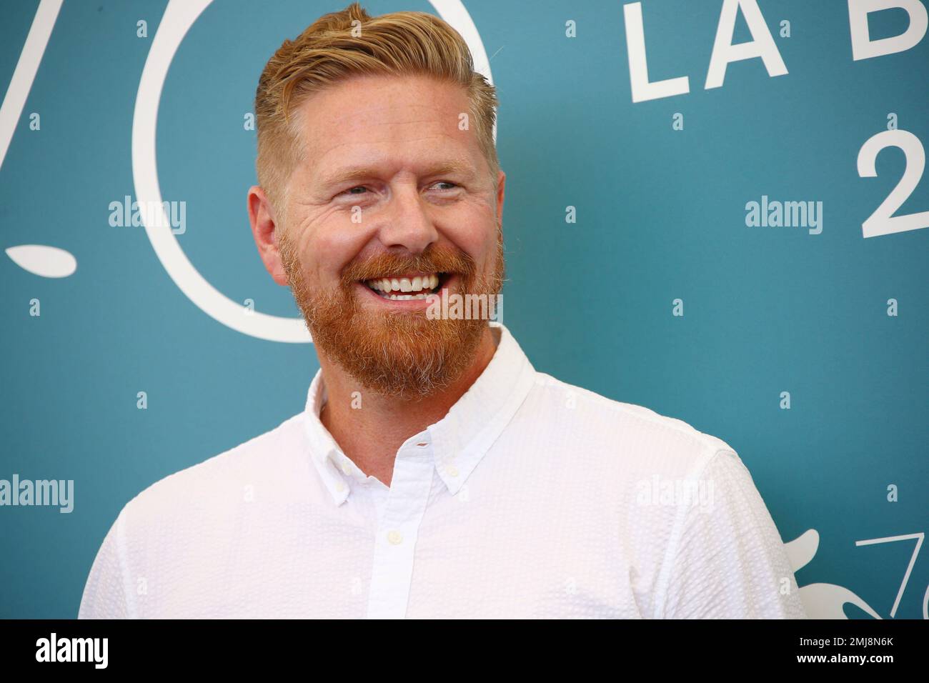 Director Matthew Michael Carnahan pose for photographers at the photo ...