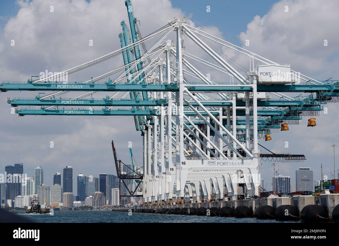 In this July 24, 2019 photo, large cranes to unload container ships are ...