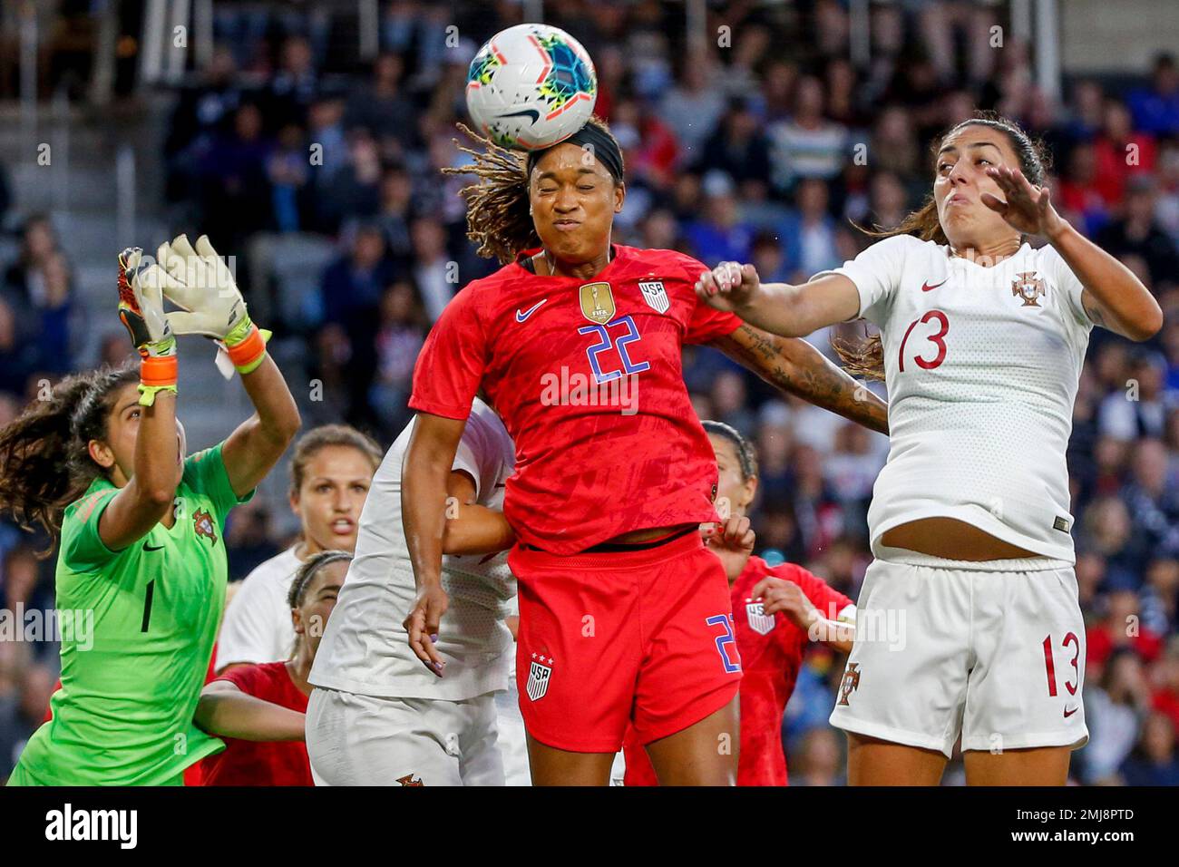 United States' Jessica McDonald (22) heads the ball between Portugal's ...