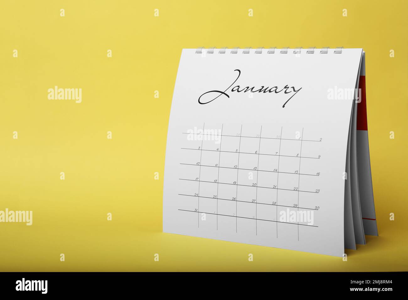 Paper calendar on yellow background, space for text. Planning concept ...