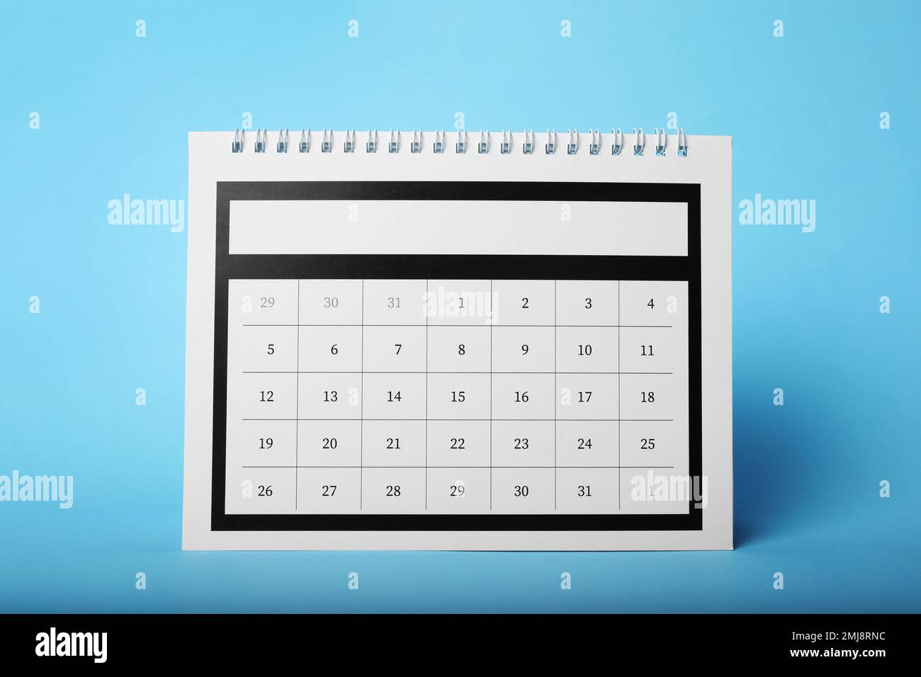 Paper calendar on light blue background. Planning concept Stock Photo ...