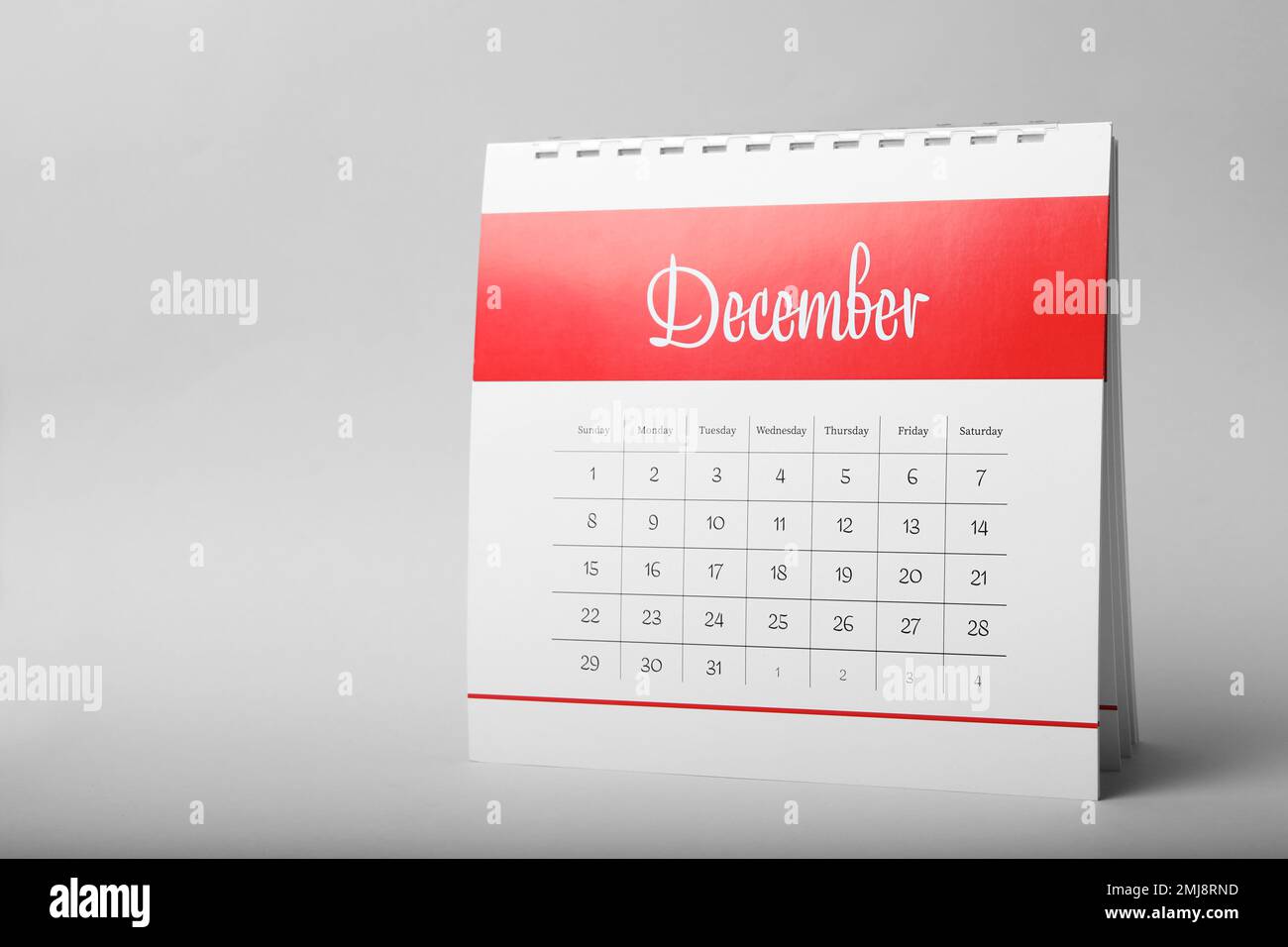 Paper calendar on grey background. Planning concept Stock Photo - Alamy