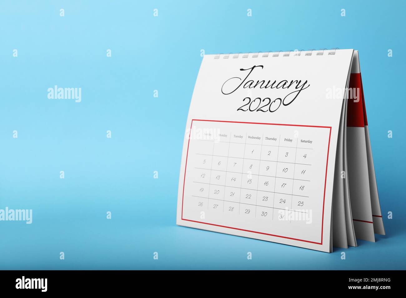 Paper calendar on light blue background, space for text. Planning ...
