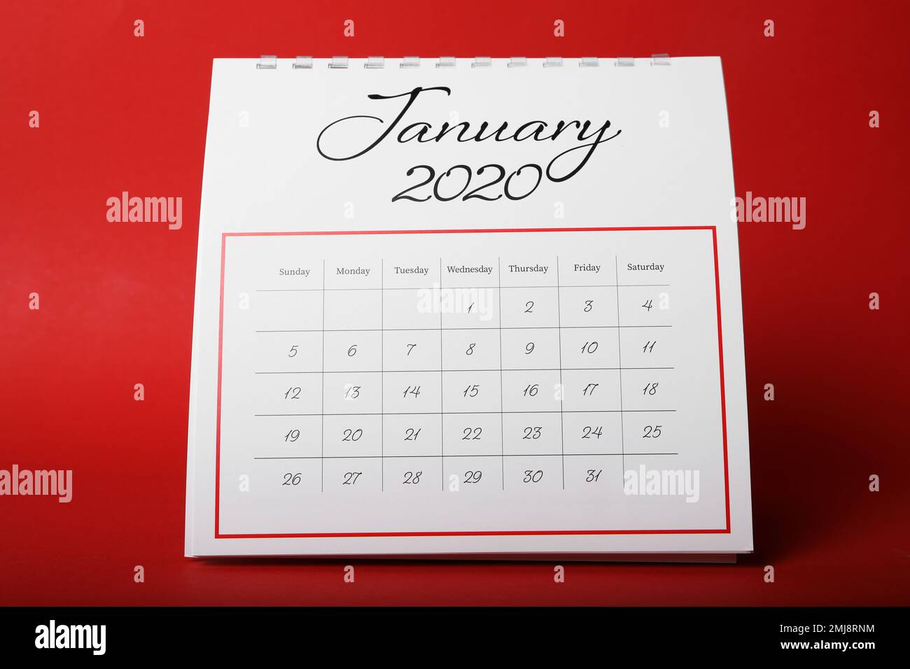 Paper calendar on red background. Planning concept Stock Photo - Alamy