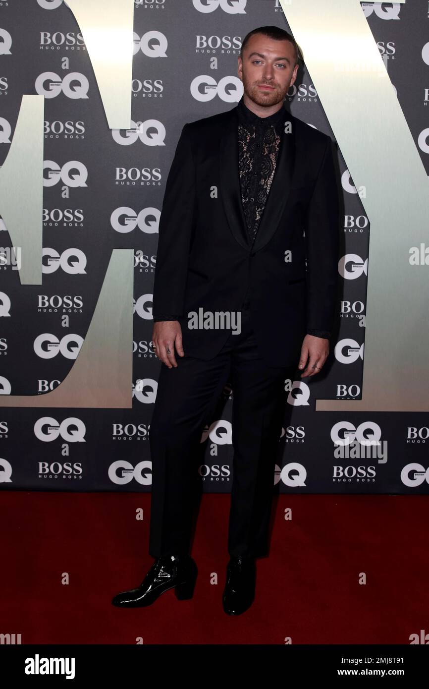 Musician Sam Smith poses for photographers on arrival at the GQ Men of ...