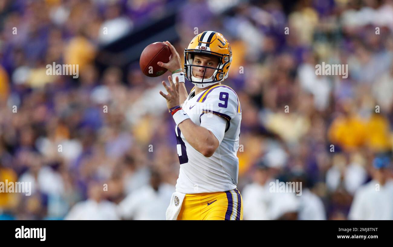 LSU quarterback Joe Burrows (9) throws the ball during an NCAA football ...