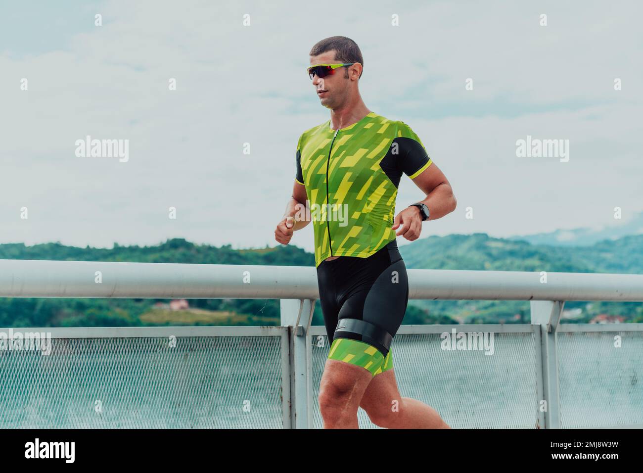 An athlete running a marathon and preparing for his competition. Photo ...