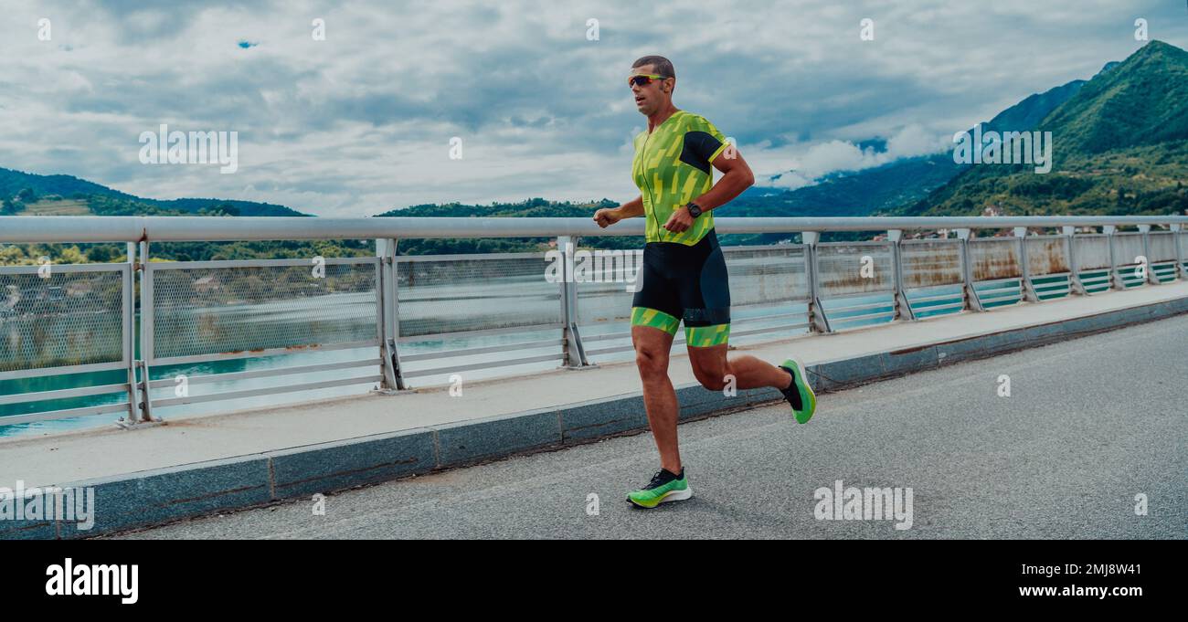 An athlete running a marathon and preparing for his competition. Photo ...
