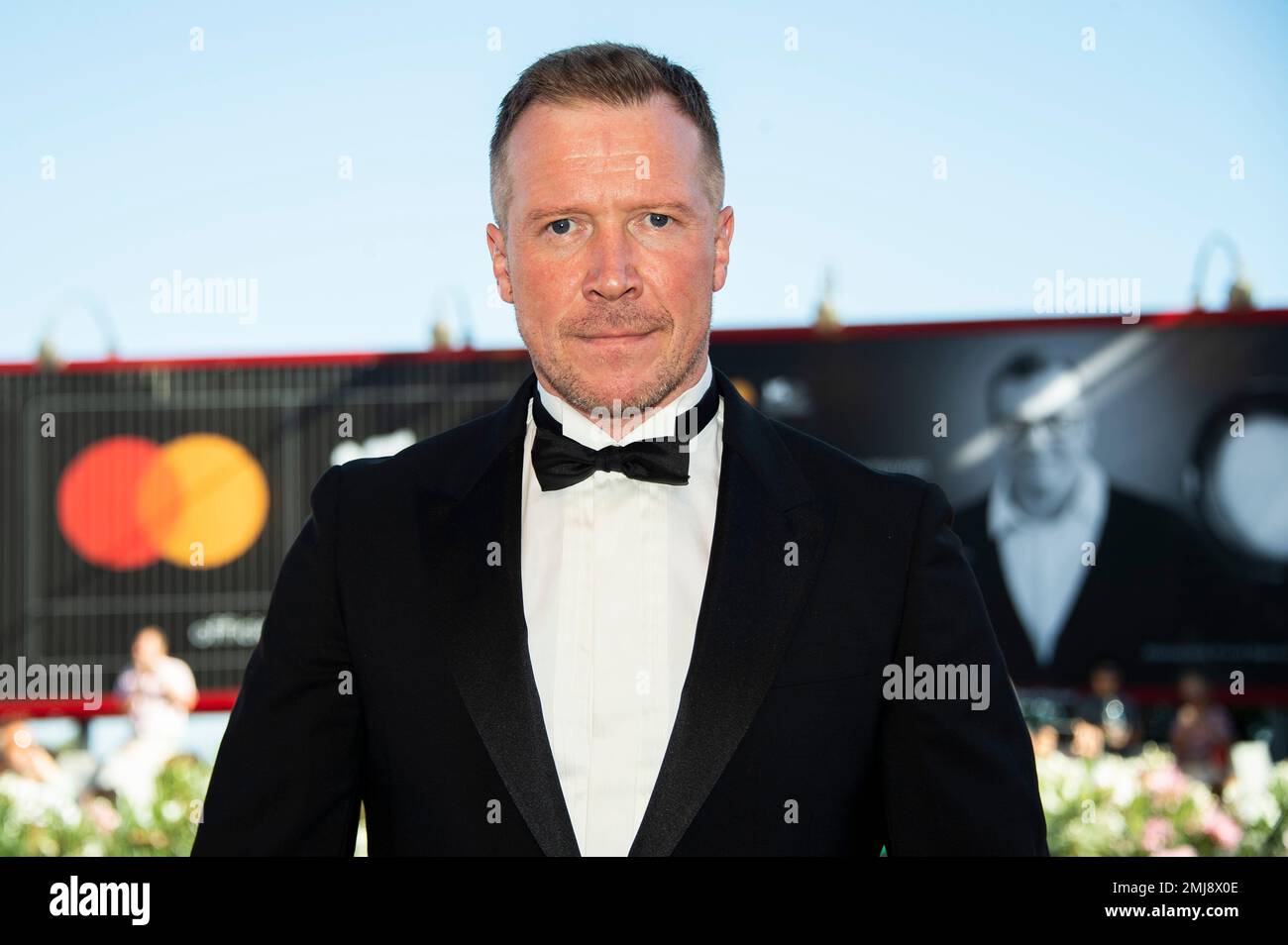 Aleksei Kravchenko poses for photographers upon arrival at the premiere ...