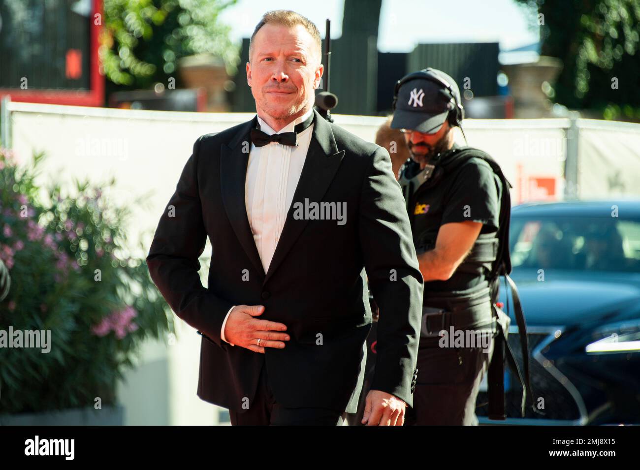 Aleksei Kravchenko poses for photographers upon arrival at the premiere ...
