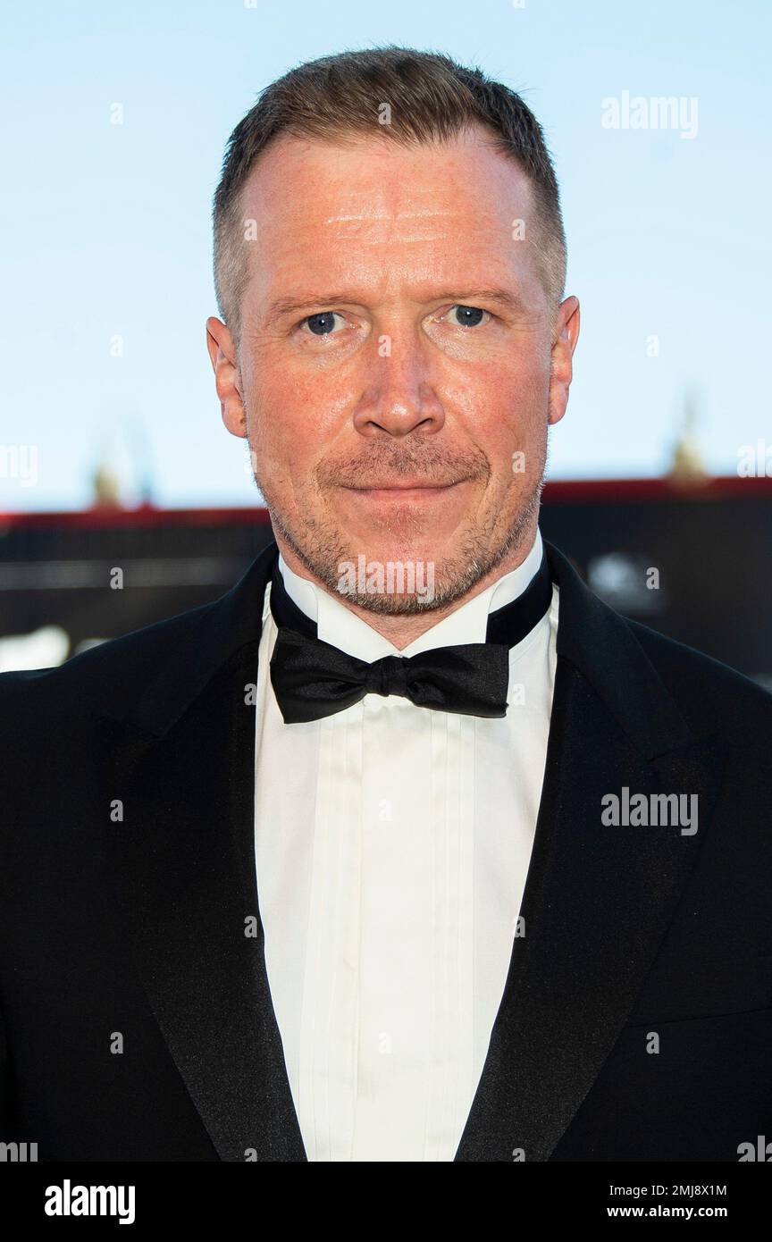 Aleksei Kravchenko poses for photographers upon arrival at the premiere ...