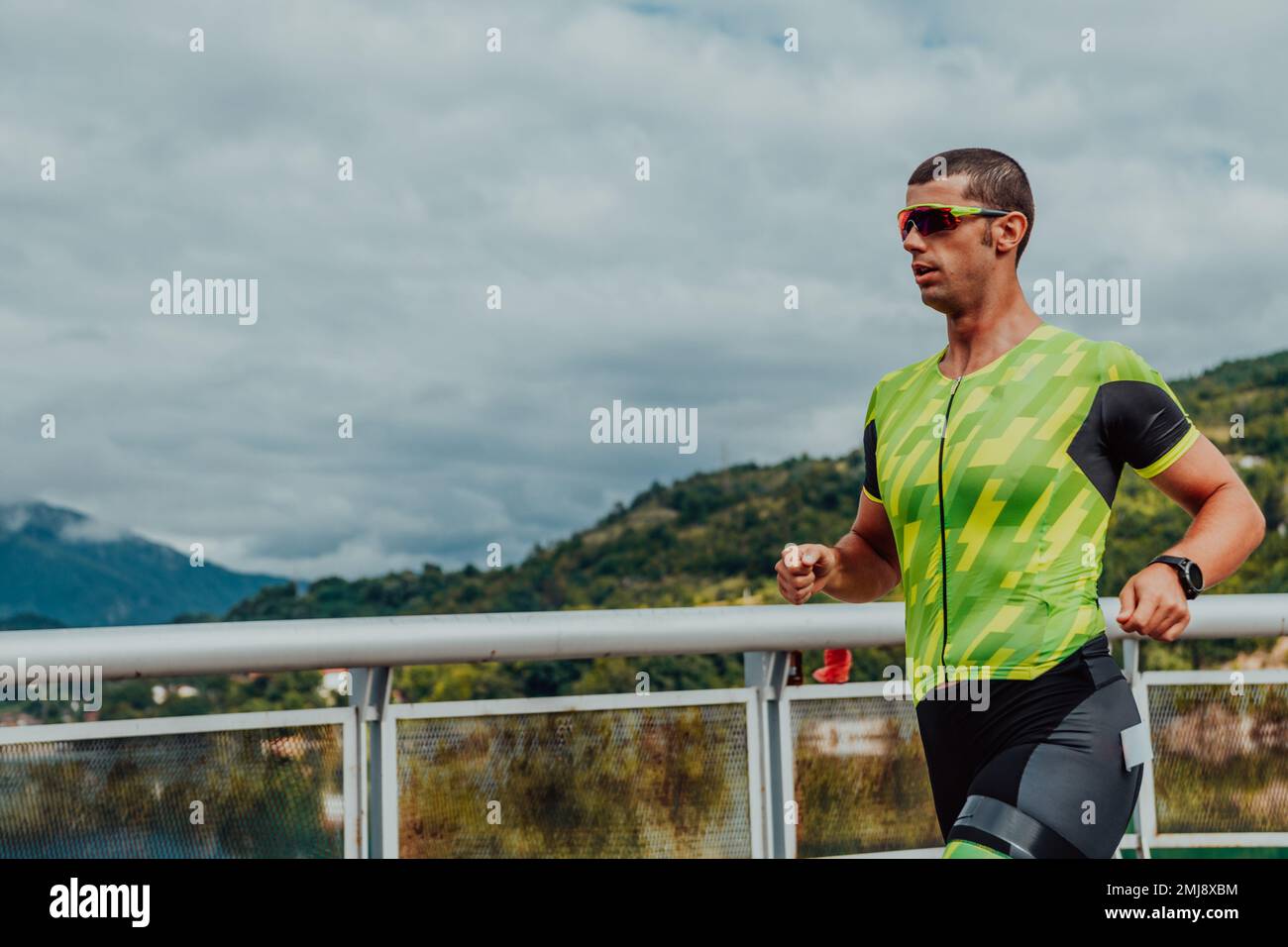 An athlete running a marathon and preparing for his competition. Photo ...