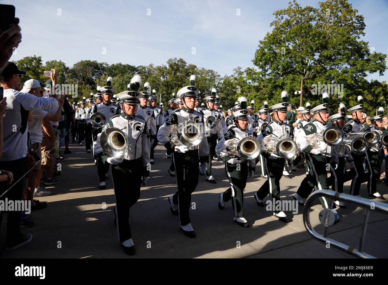 Spartan Marching Band members enter Spartan Stadium before the start of ...