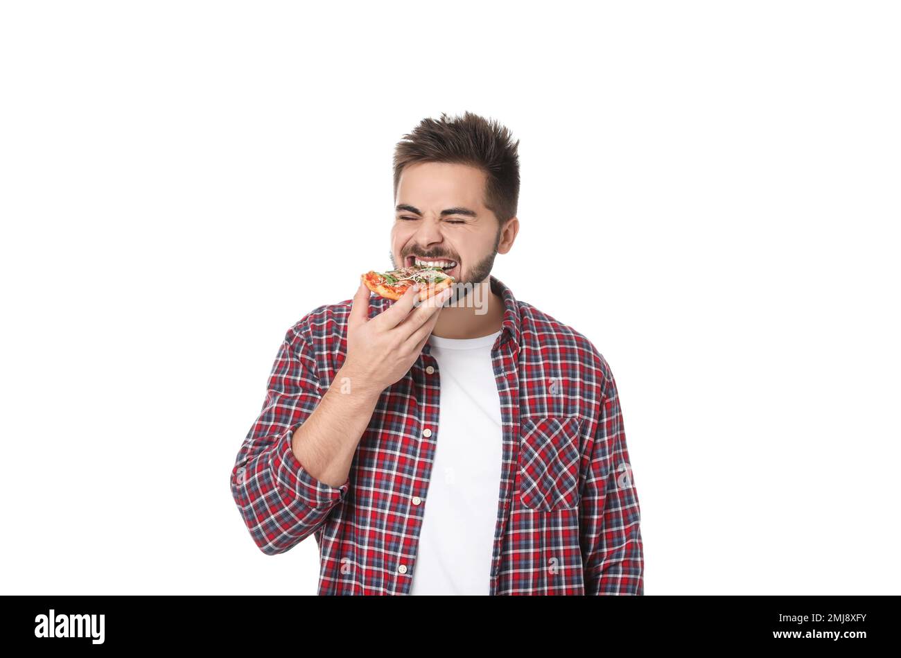 Emotional man eating pizza isolated on white Stock Photo - Alamy