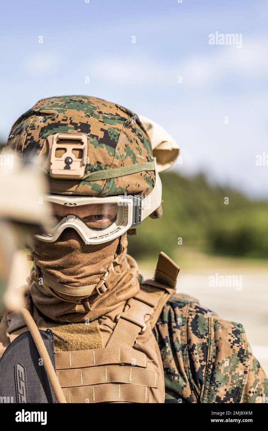 A U.S. Marine with Combat Logistics Battalion 4 prepares to attach a ...