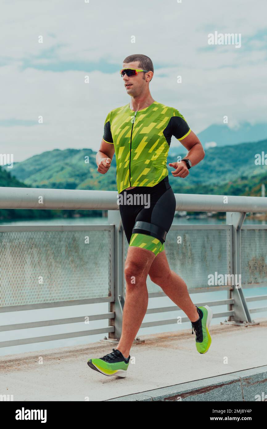 An athlete running a marathon and preparing for his competition. Photo ...