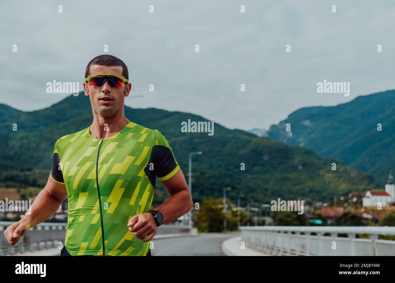An athlete running a marathon and preparing for his competition. Photo ...