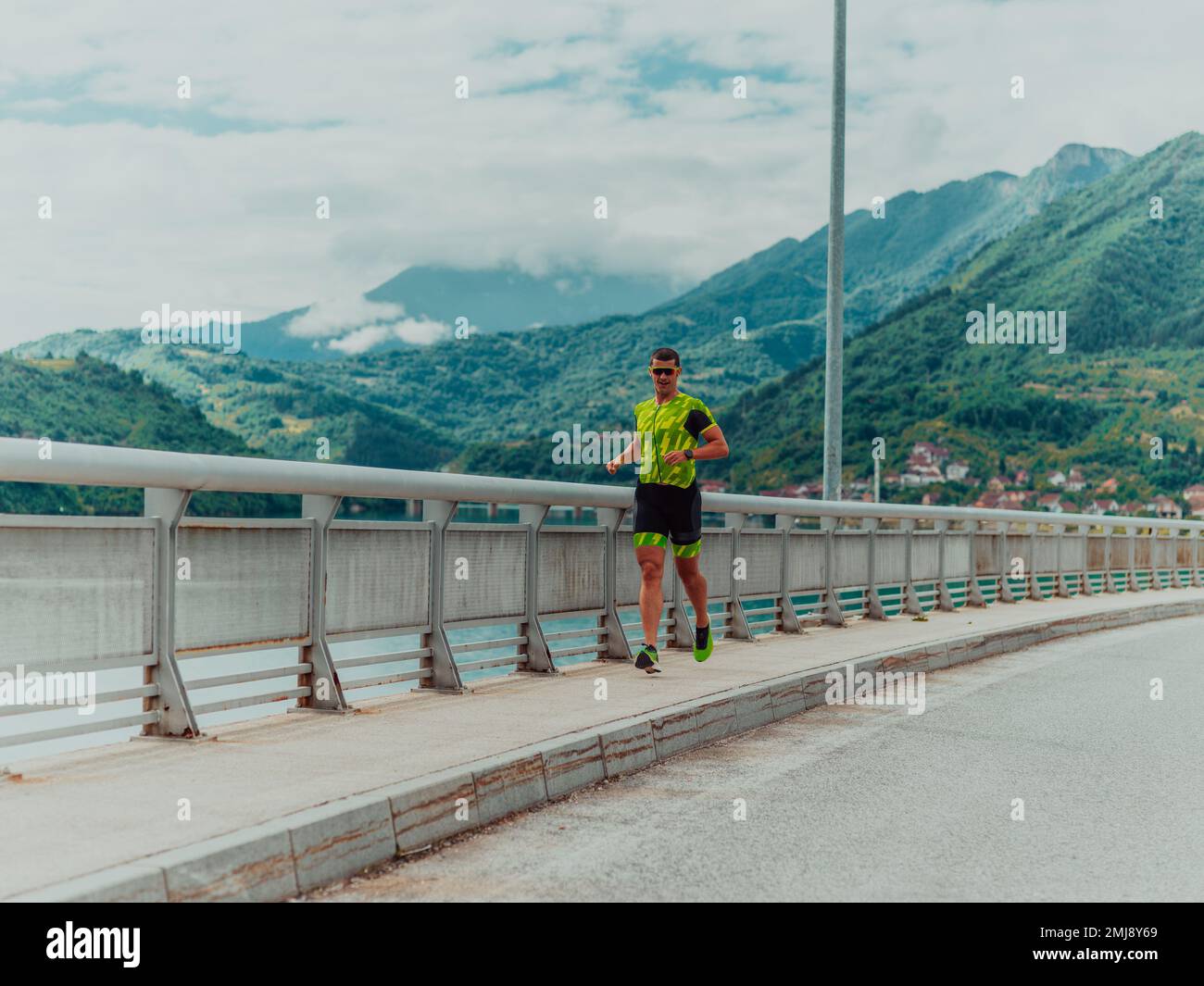 An athlete running a marathon and preparing for his competition. Photo ...