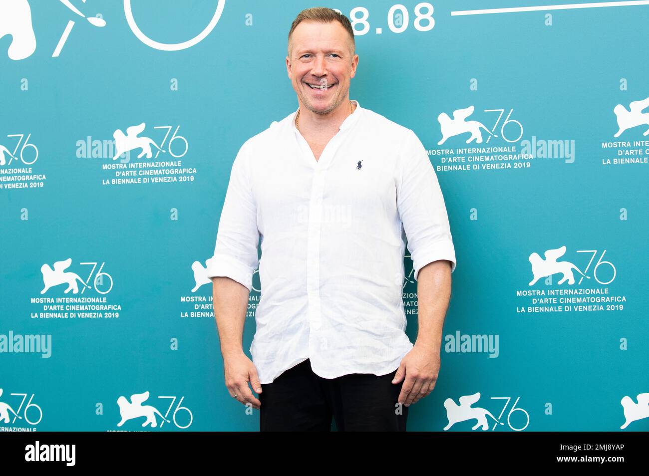 Actor Aleksei Kravchenko poses for photographers at the photo call for ...