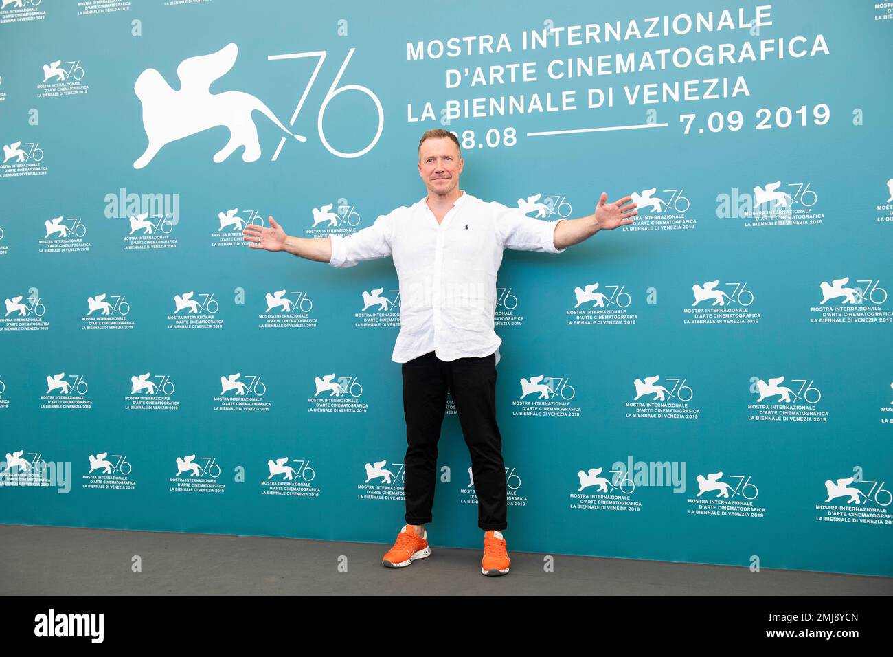 Actor Aleksei Kravchenko poses for photographers at the photo call for ...