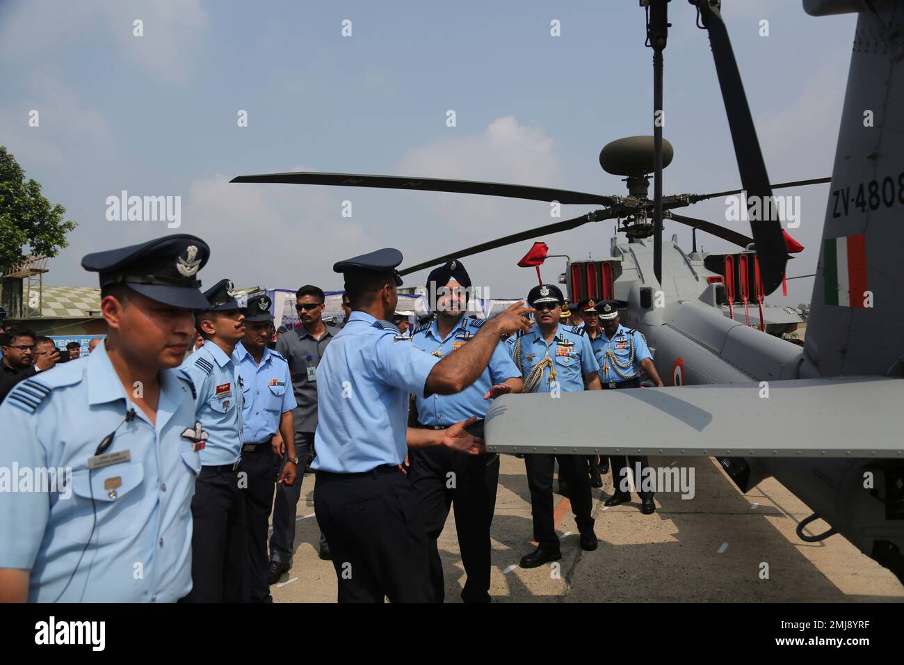 Indian Air Force Chief B S Dhanoa, center wearing turban, inspects a AH ...