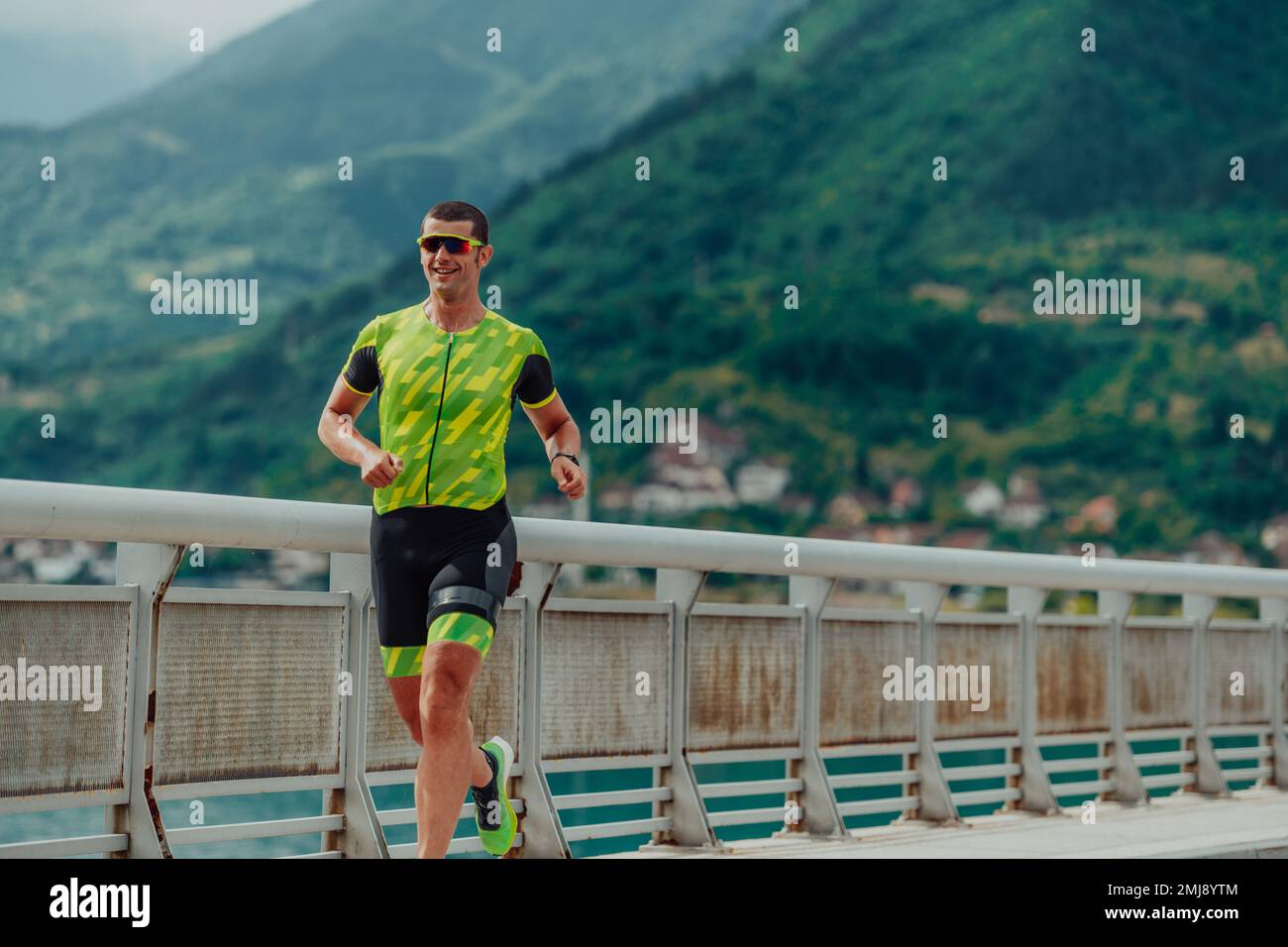 An athlete running a marathon and preparing for his competition. Photo ...
