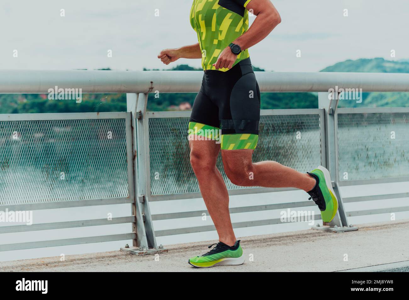 An athlete running a marathon and preparing for his competition. Photo ...