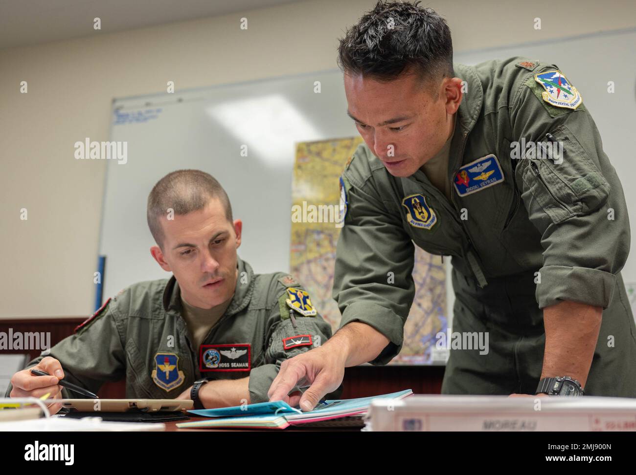 U.S. Air Force Maj. Luke “Hoss” Seaman, left, and Maj. Herbie “Snooki ...