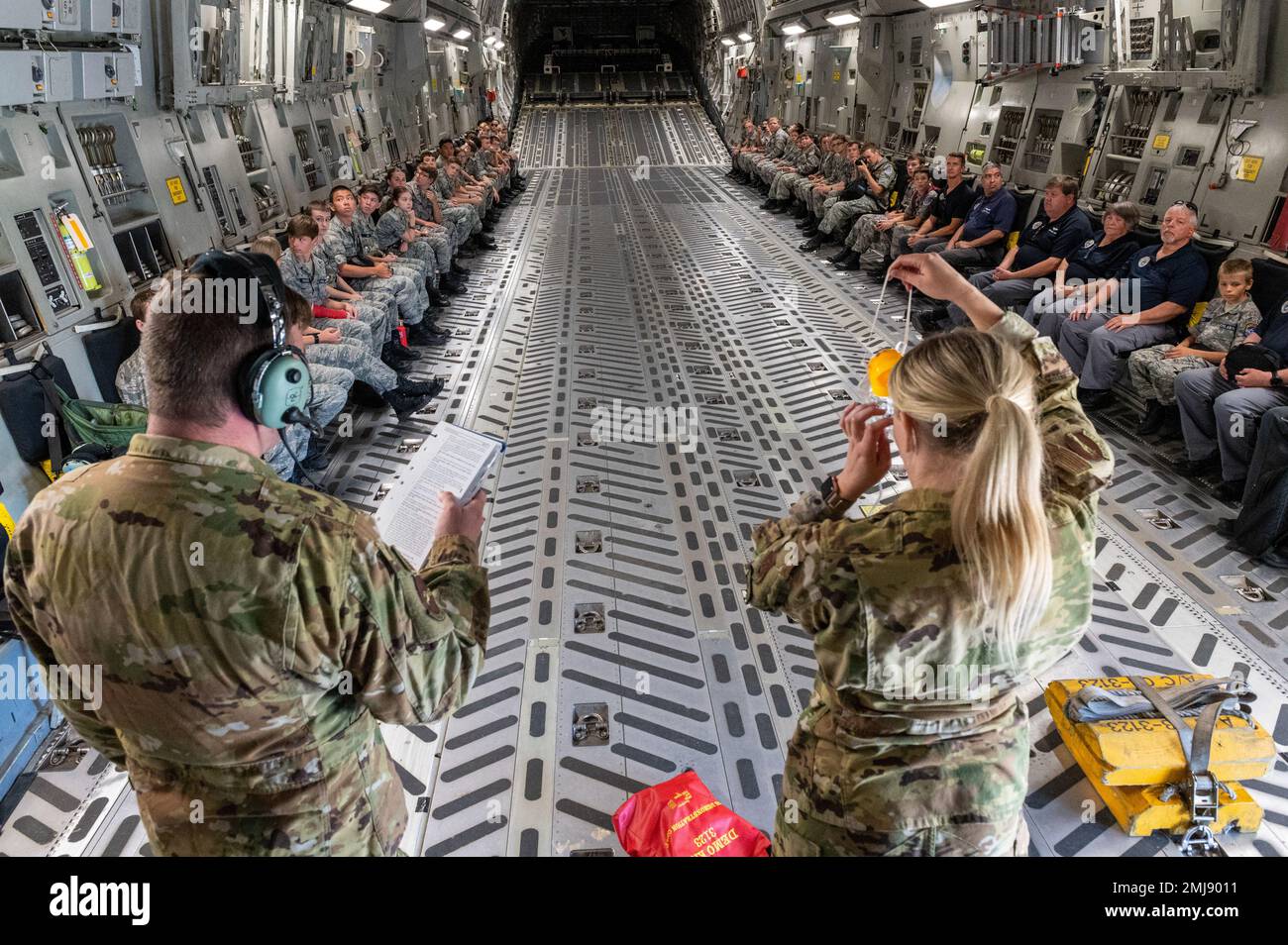 U.S. Air Force Senior Airman Raymie Roberts and Tech. Sgt. Sarah Hall ...