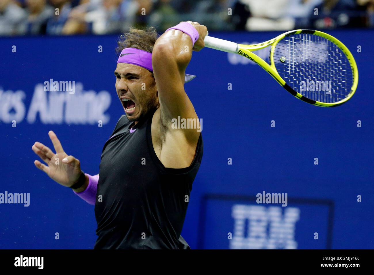 Rafael Nadal, of Spain, plays against Marin Cilic, of Croatia, during ...