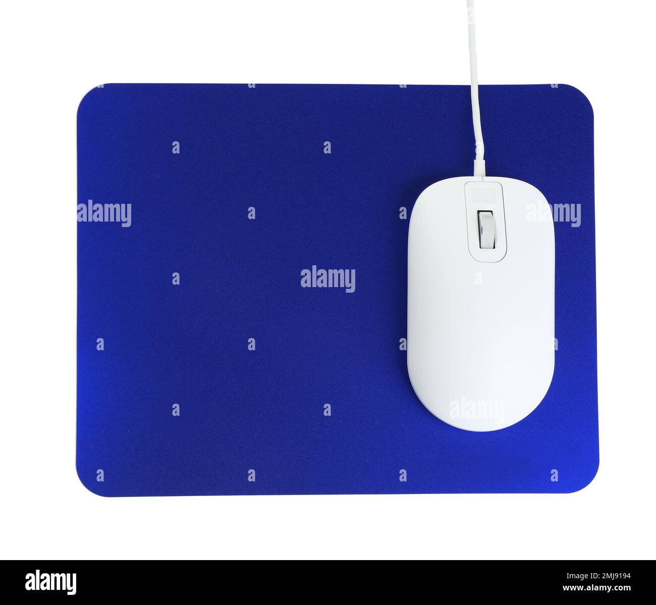 Modern wired optical mouse and blue pad isolated on white, top view ...