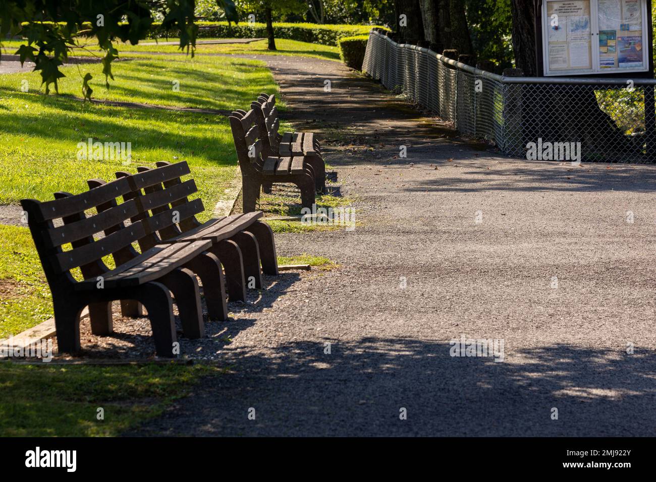 Benches offer visitors a peaceful sitting area at the Tygart Dam day ...