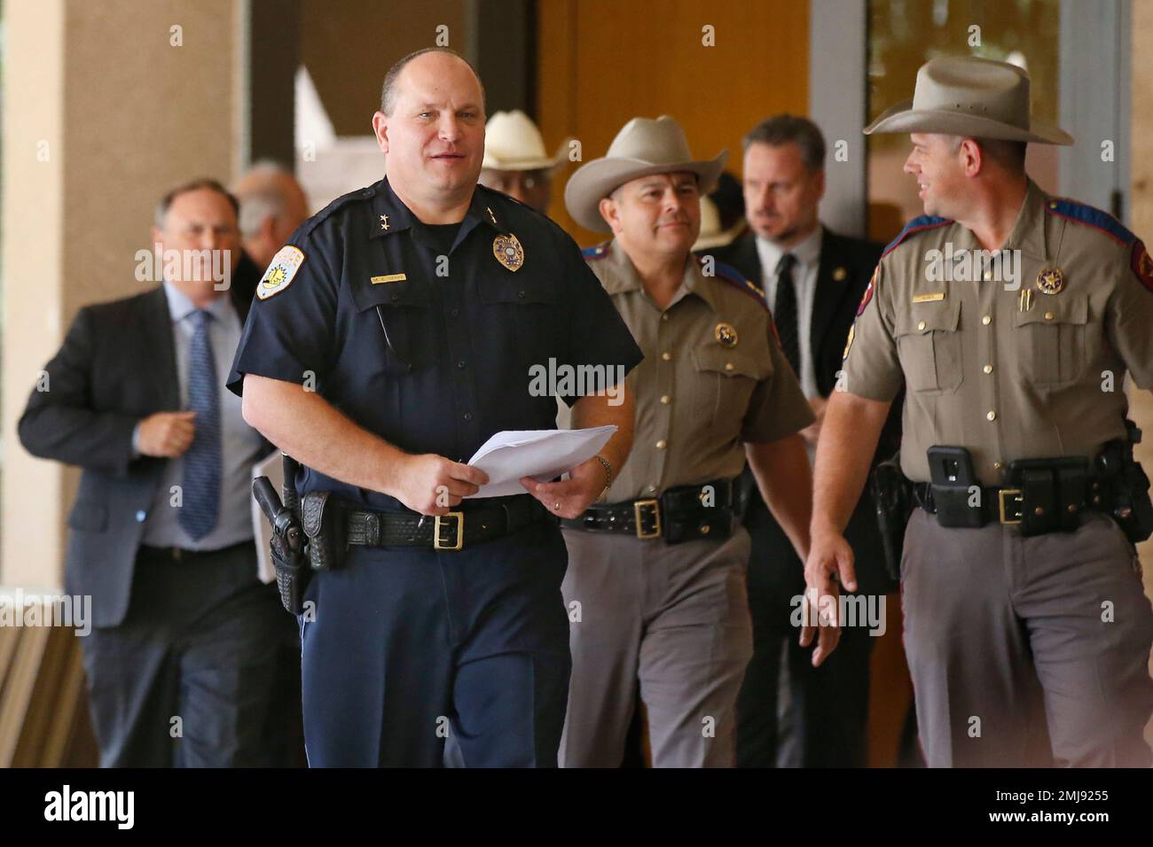 Odessa Police Chief Michael Gerke, left, arrives for a news conference ...